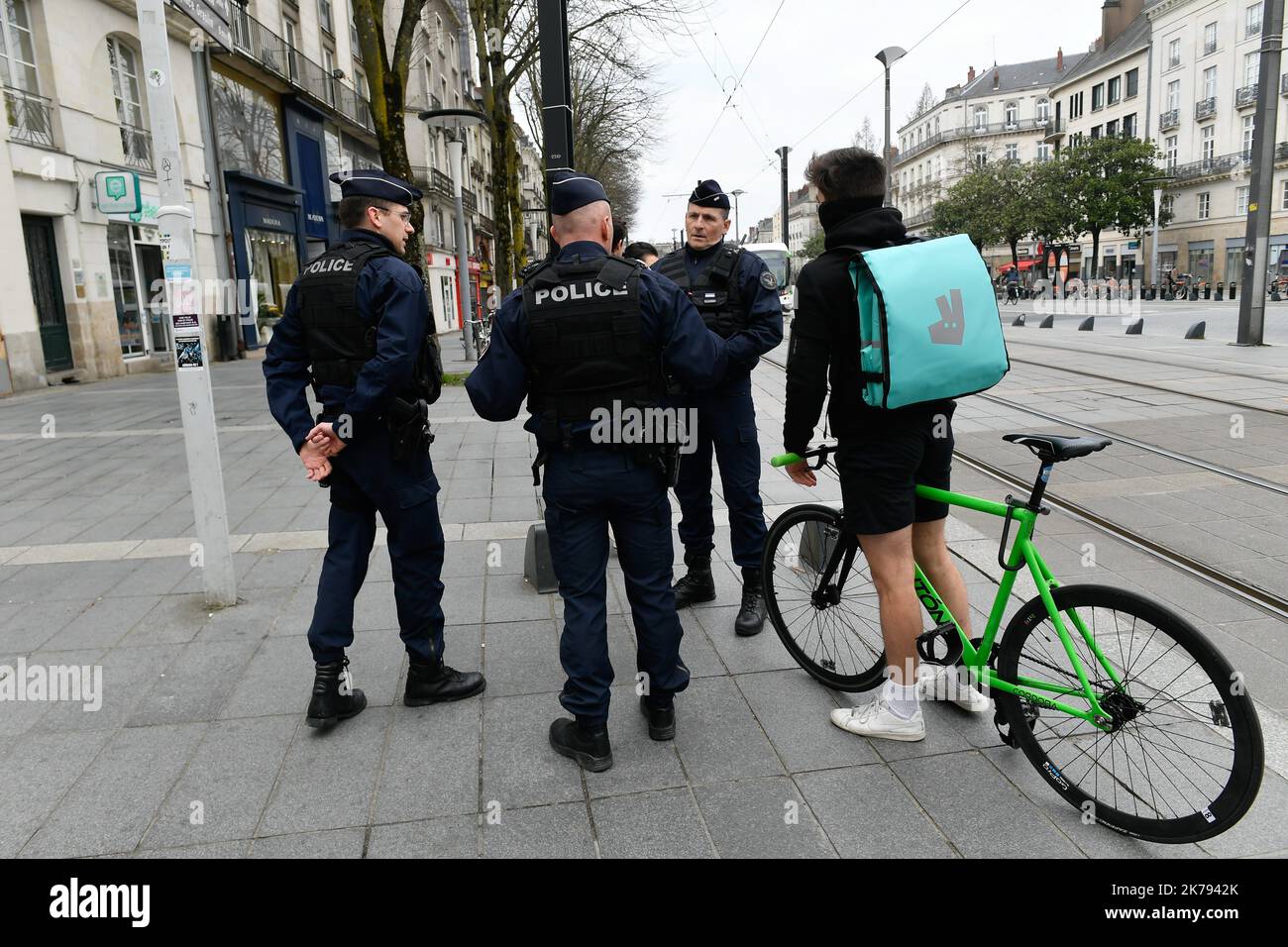 The national police patrol the streets to ensure proper compliance with ...
