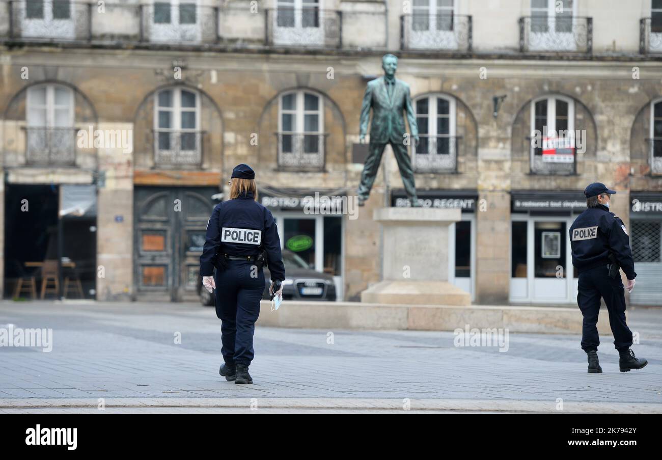 The national police patrol the streets to ensure proper compliance with ...