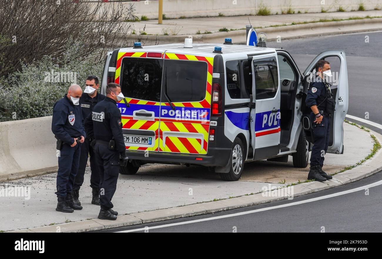 Traffic control by national police officers following containment ...