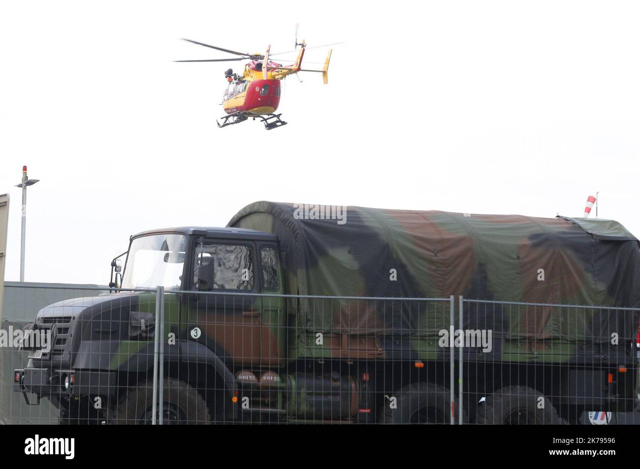 Soldiers prepare the installation of the army field hospital in front ...