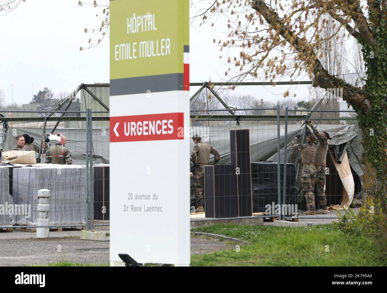Soldiers are installing a military field hospital near the Emile Muller ...