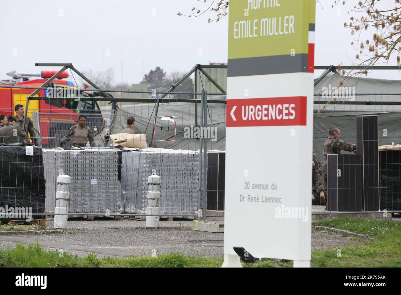 Soldiers are installing a military field hospital near the Emile Muller ...