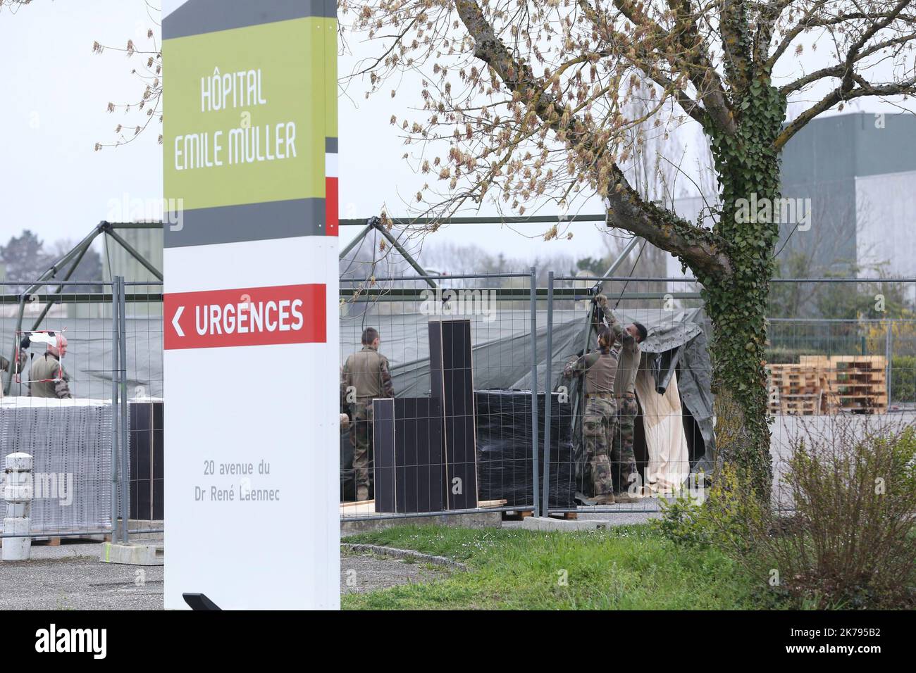 Soldiers are installing a military field hospital near the Emile Muller ...