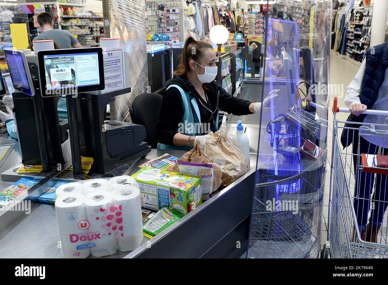 At the Super U store in Châteaubourg, the cashier hostesses are ...