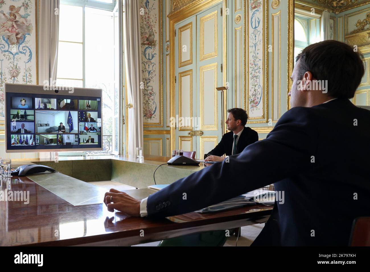 The President of the Republic, Emmannuel Macron participates in a video ...