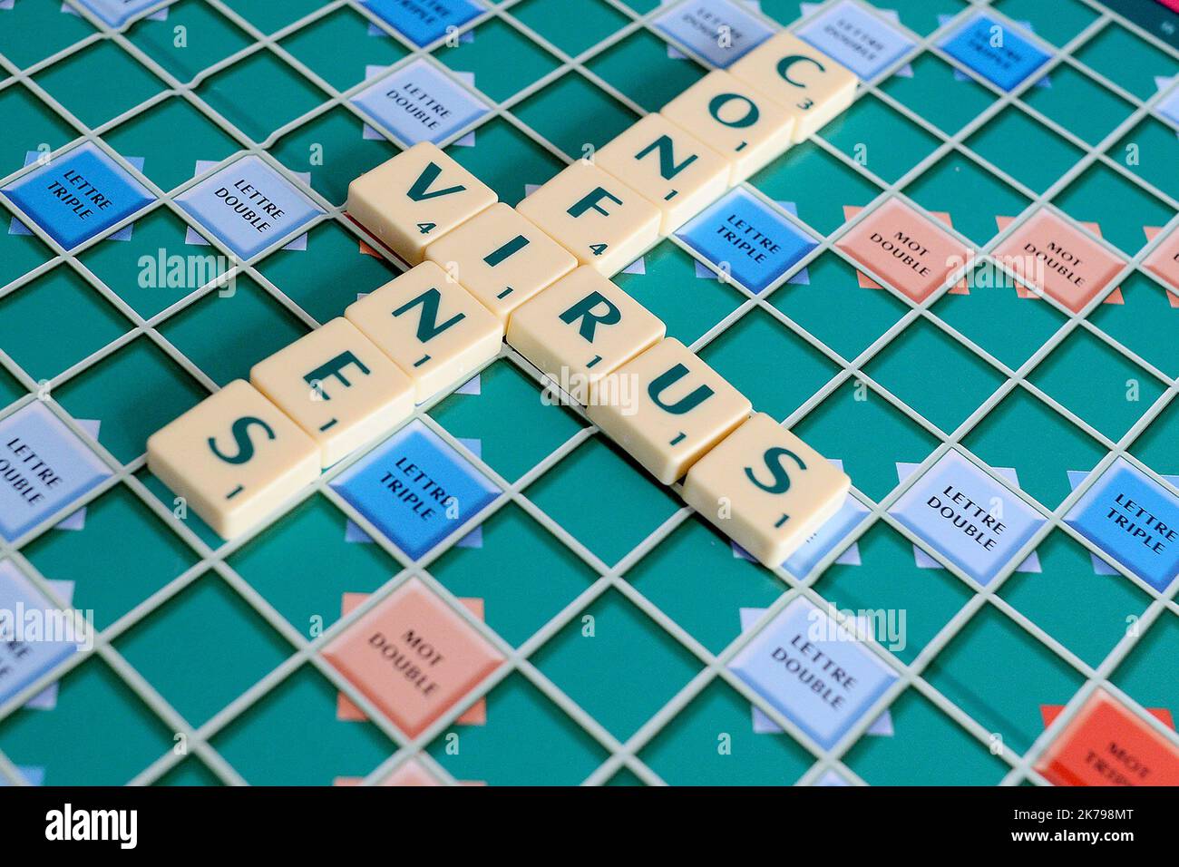 People play Scrabble during the lockdown confinement caused by the ...