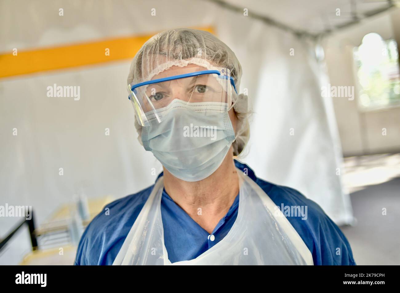 Medical staff including doctors and nurses carry out duties at private ...