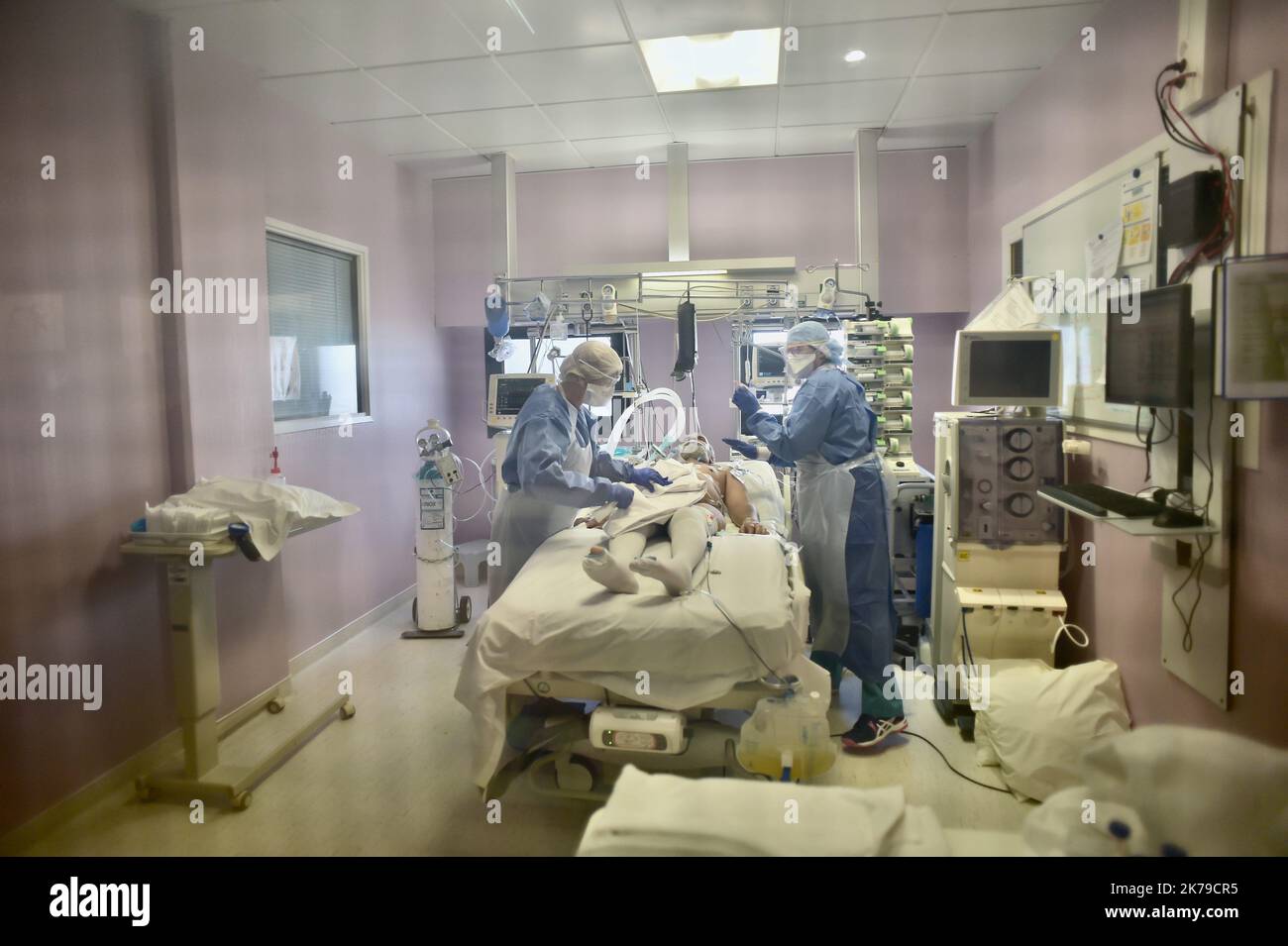 Medical staff including doctors and nurses carry out duties at private ...