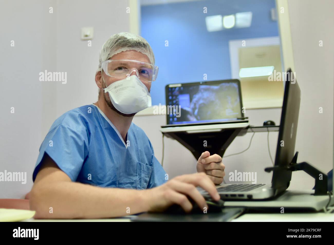 Medical staff including doctors and nurses carry out duties at private ...