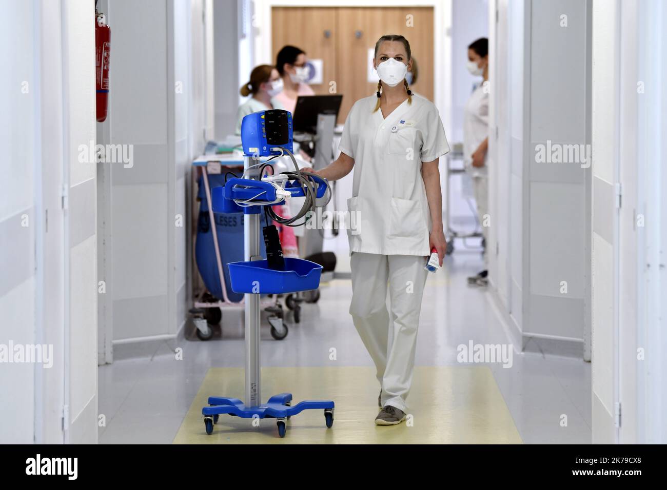 Medical staff including doctors and nurses at the CHRU de Nancy ...