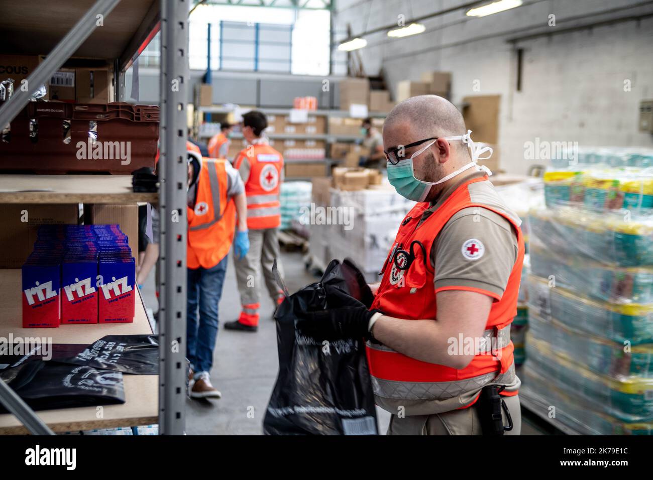 France / Rhone Alpes / Lyon - A French Red Cross volunteer, wearing a ...