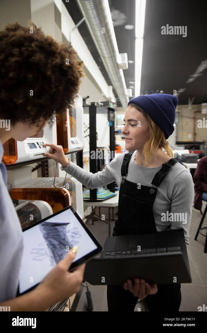 Printer with apprentice hi-res stock photography and images - Alamy