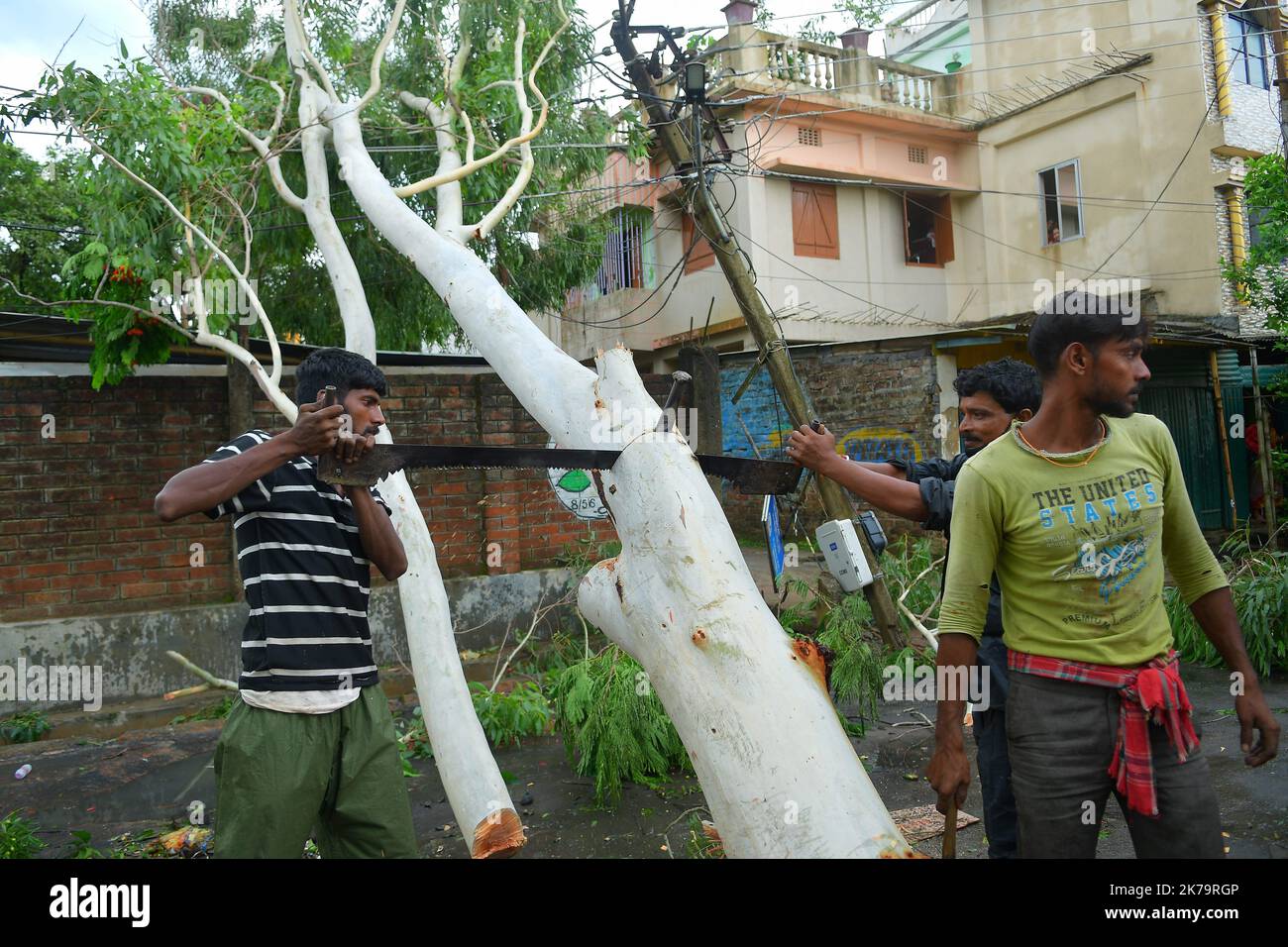 India / Tripura / Agartala - AMC (Agartala Municipal Corporation) workers clean the roads of ...