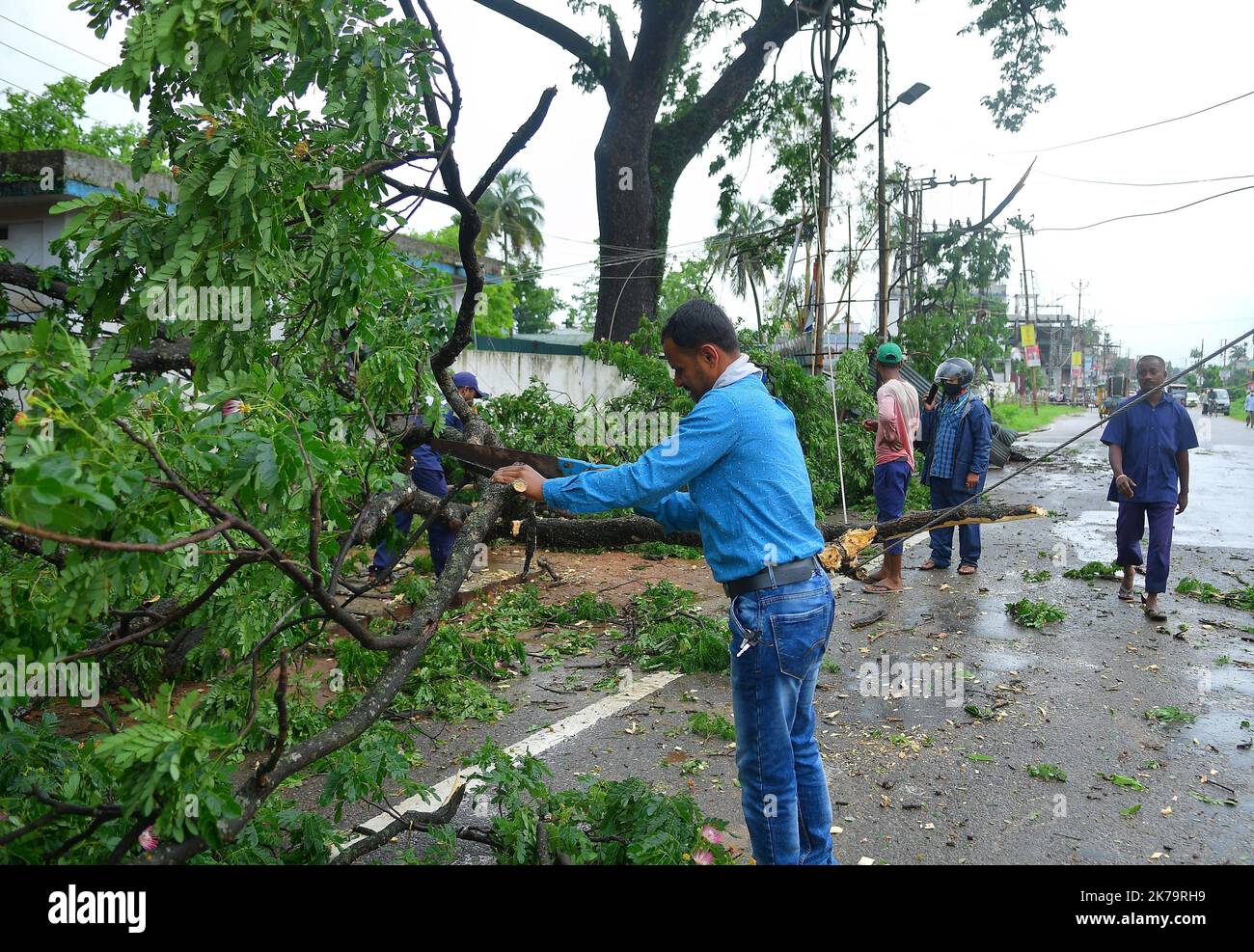 India / Tripura / Agartala - AMC (Agartala Municipal Corporation) workers clean the roads of ...