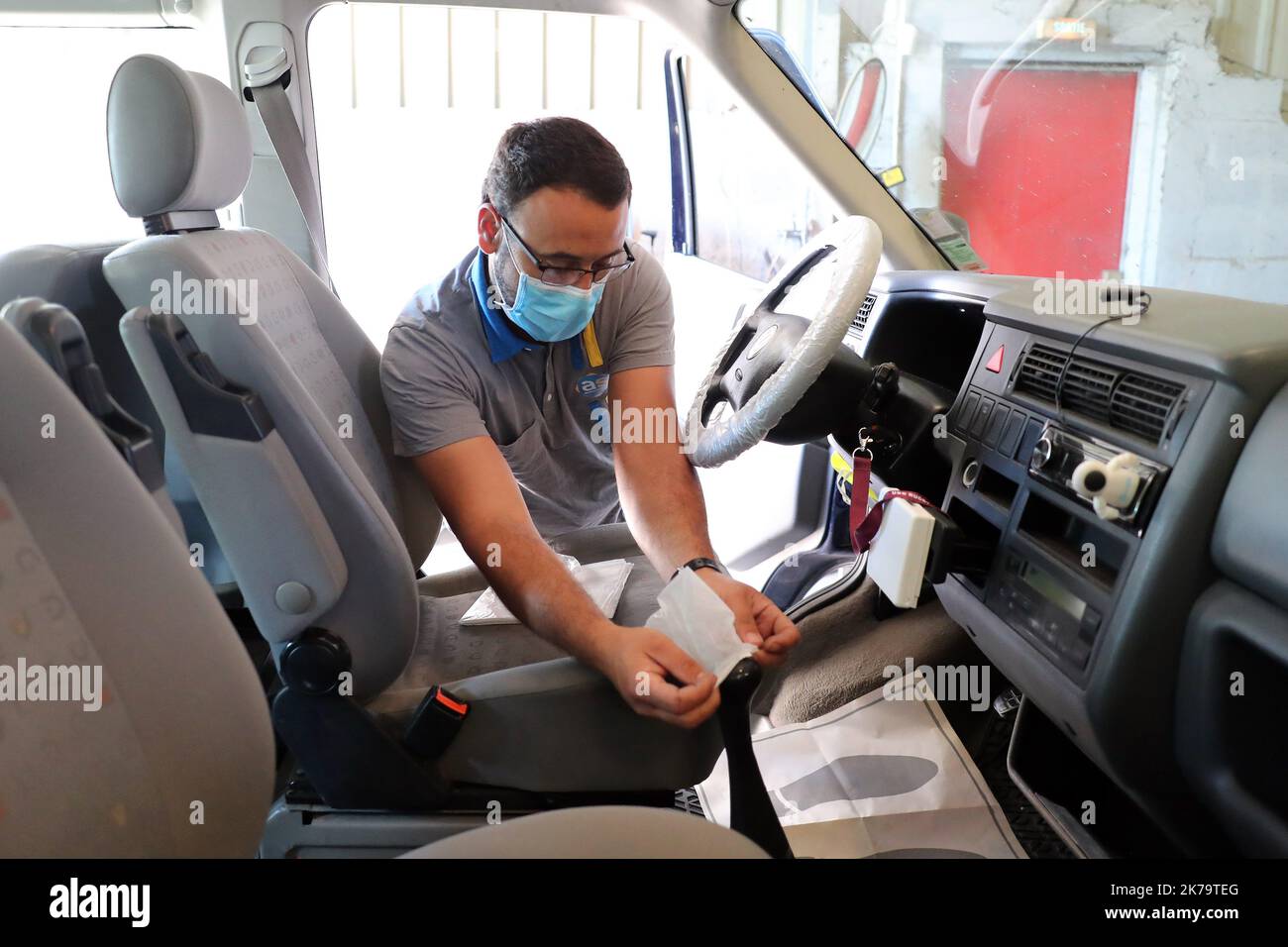 Latresne, France. Vehicle technical control. Garages reopen to work on ...