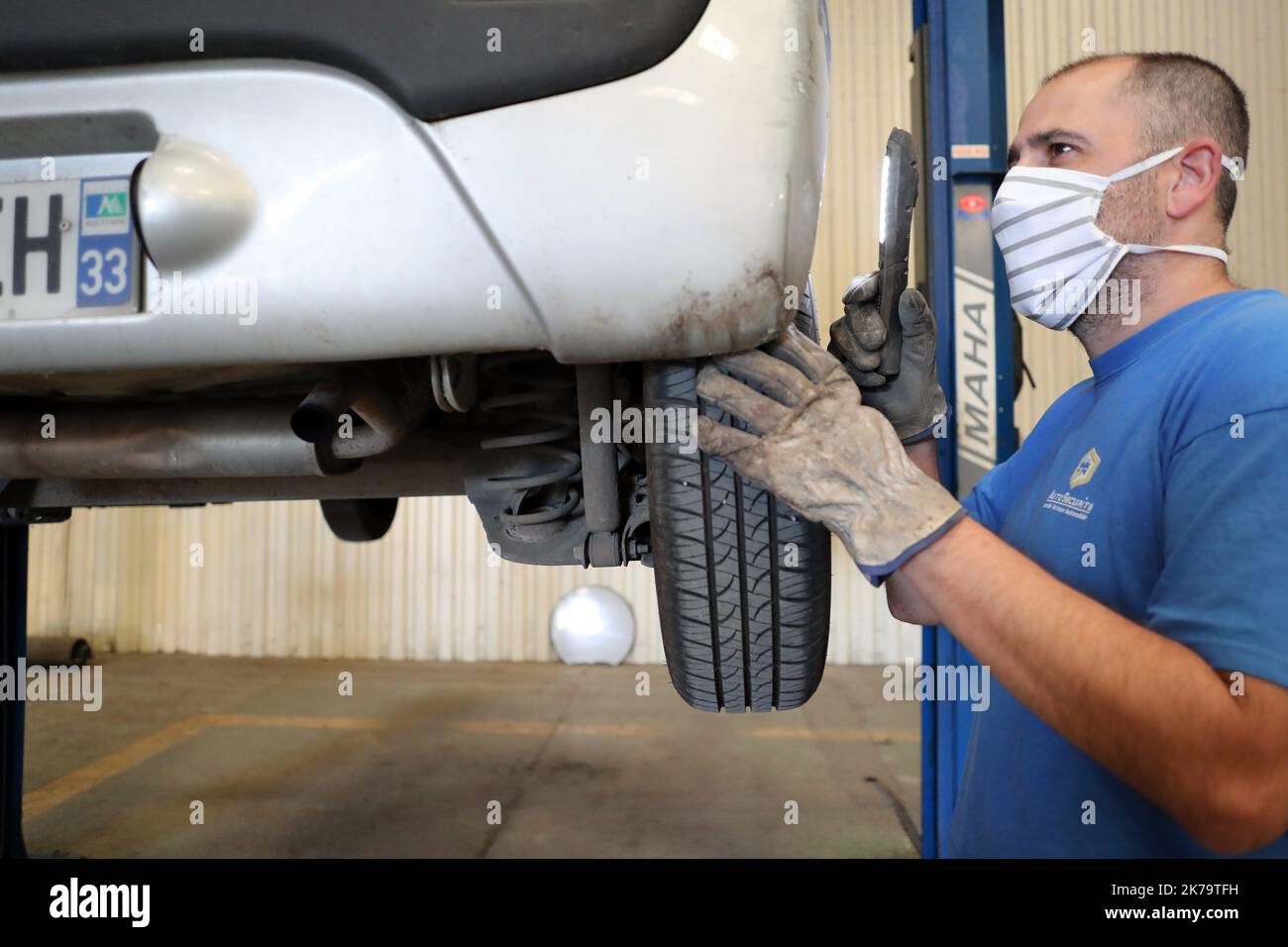 Latresne, France. Vehicle technical control. Garages reopen to work on ...
