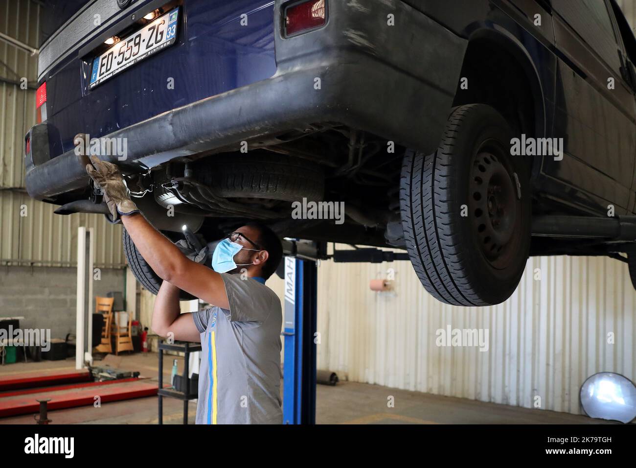 Latresne, France. Vehicle technical control. Garages reopen to work on ...