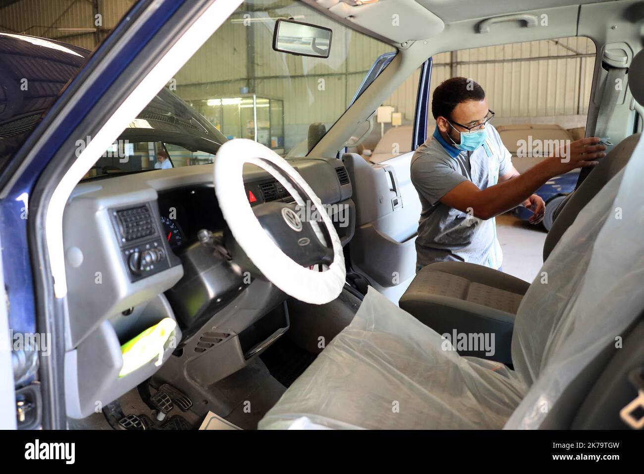 Latresne, France. Vehicle technical control. Garages reopen to work on ...