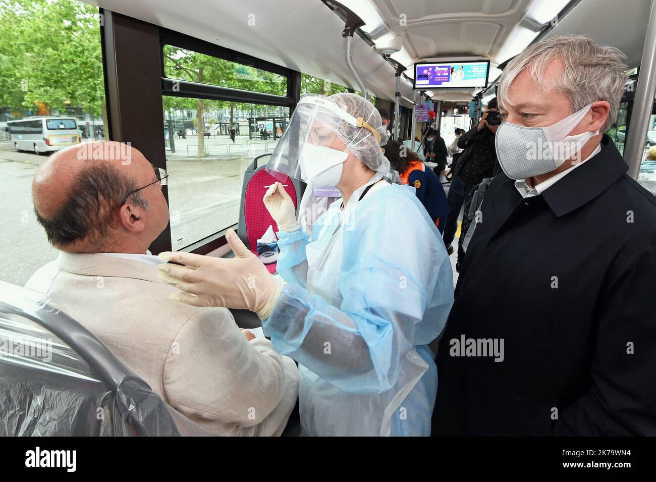 Christian RABAUD - Laurent HENART. covid test drive in a bus France ...