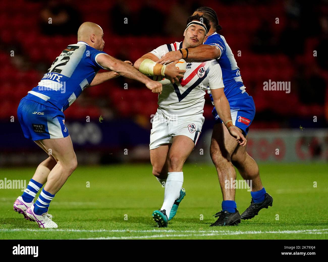 France’s Benjamin Garcia is tackled by Greece’s Robert Tuliatu (right ...