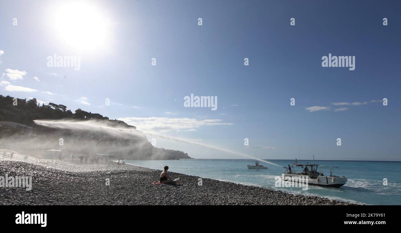Cleaning of the beaches. Nice, France Stock Photo - Alamy