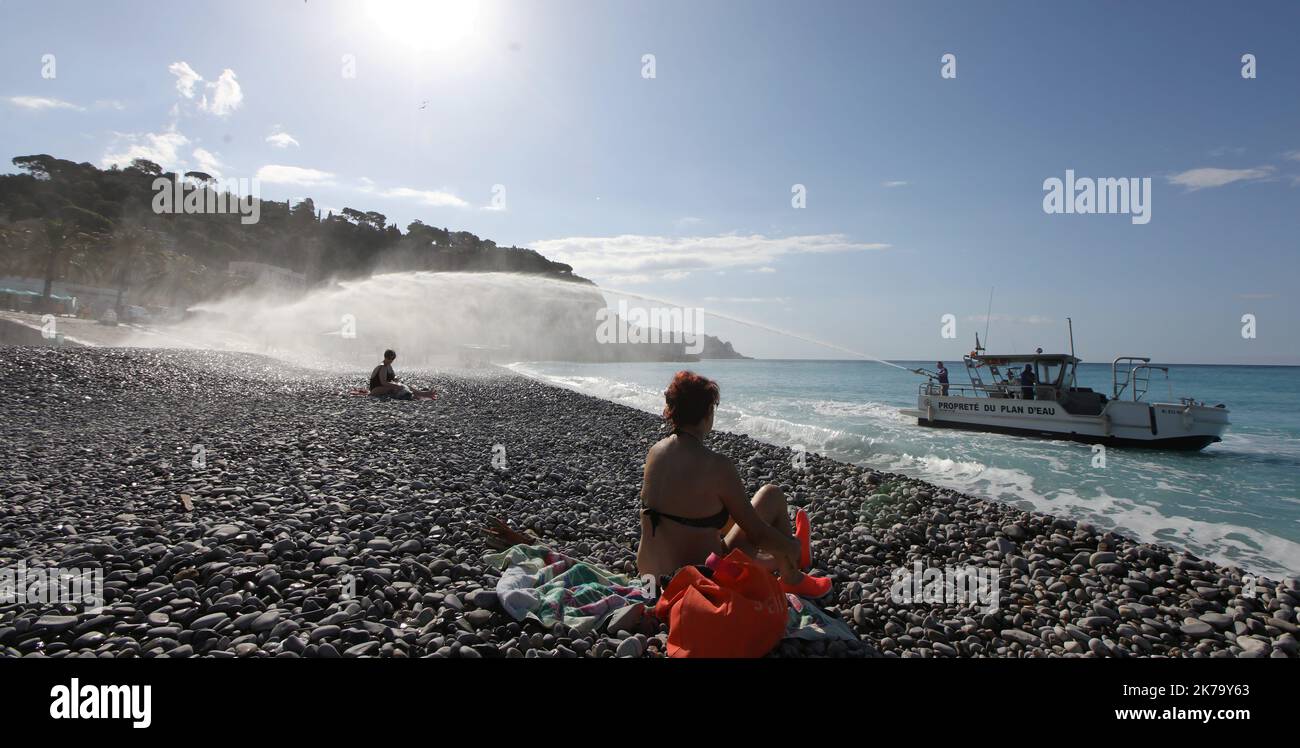 Cleaning of the beaches. Nice, France Stock Photo - Alamy