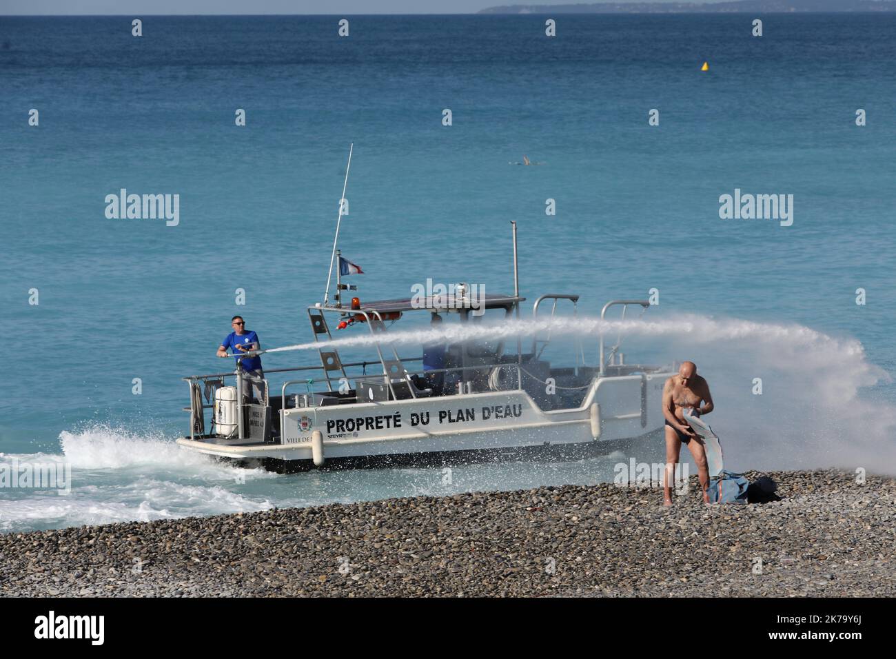 Cleaning of the beaches. Nice, France Stock Photo - Alamy