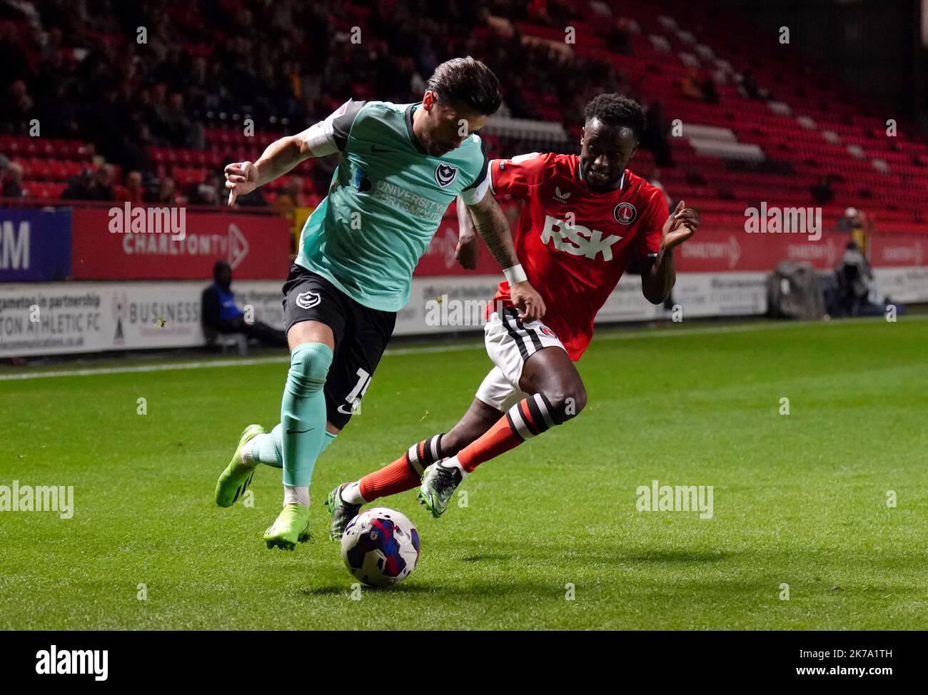 Charlton Athletic's Steven Sessegnon and Portsmouth's Owen Dale (left ...