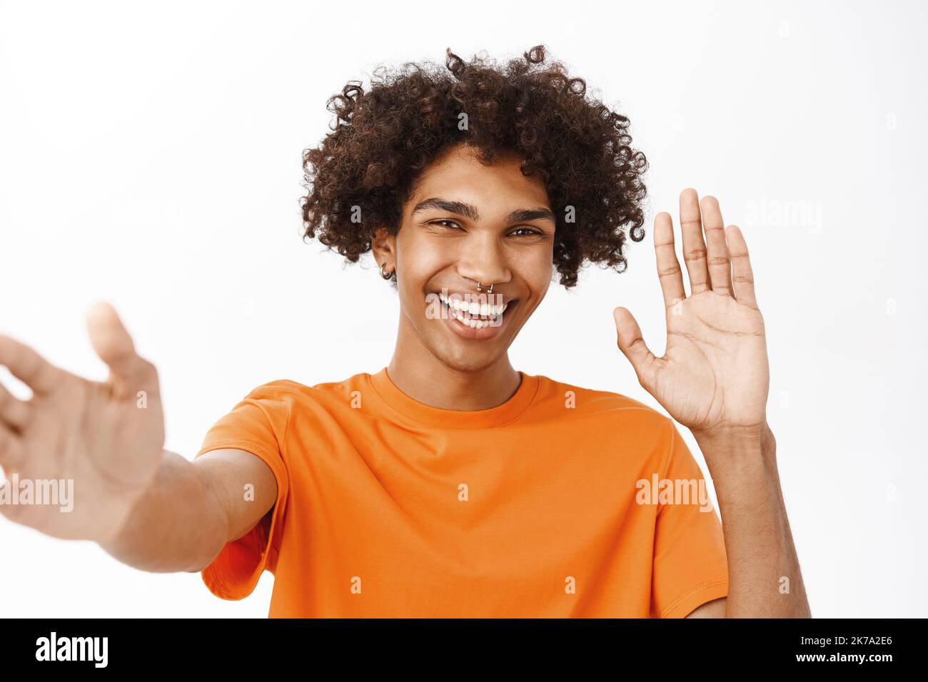 Beautiful stylish man waving smiling hi-res stock photography and ...