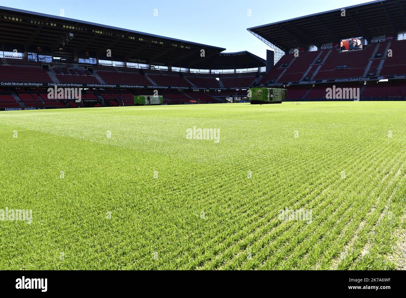 A hybrid lawn is installed at the Roazhon Park, where synthetic fibres ...