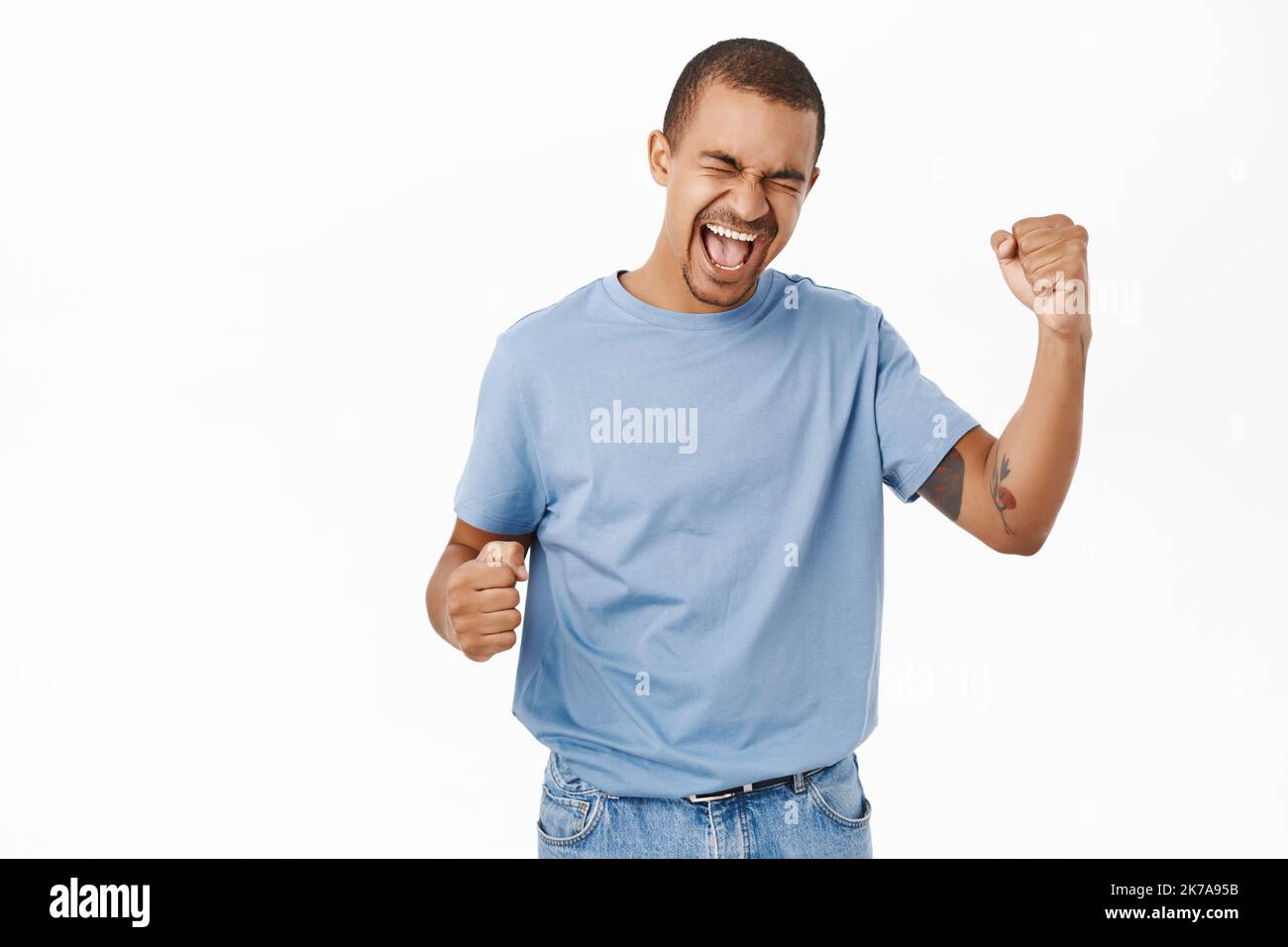 Win, triumphing people. Happy arab man cheering, celebrating victory ...