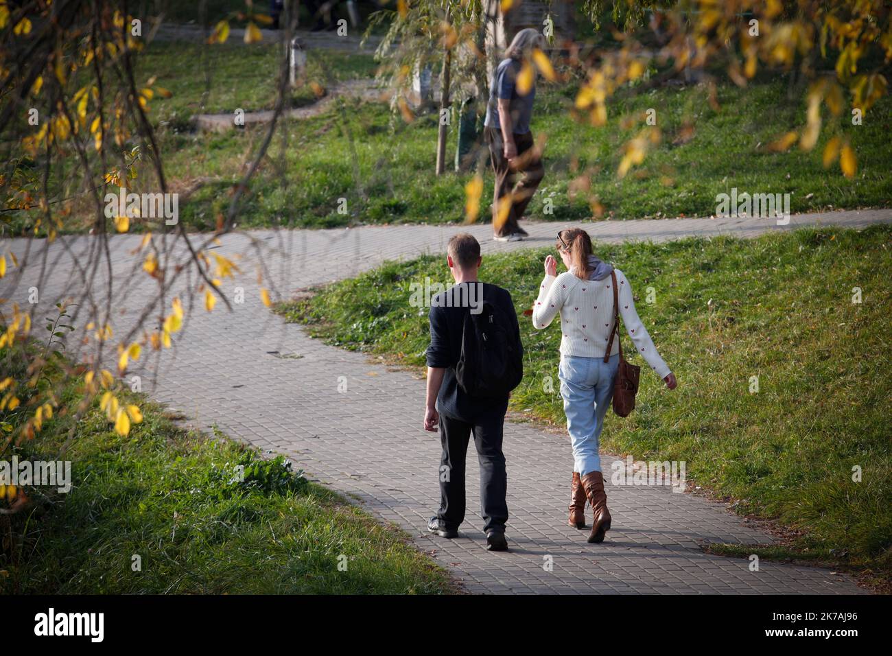 People are seen enjoying the warm weather in the Park Skaryszewski in ...