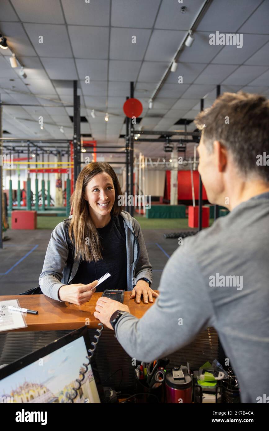 Woman using self checkout hi-res stock photography and images - Alamy