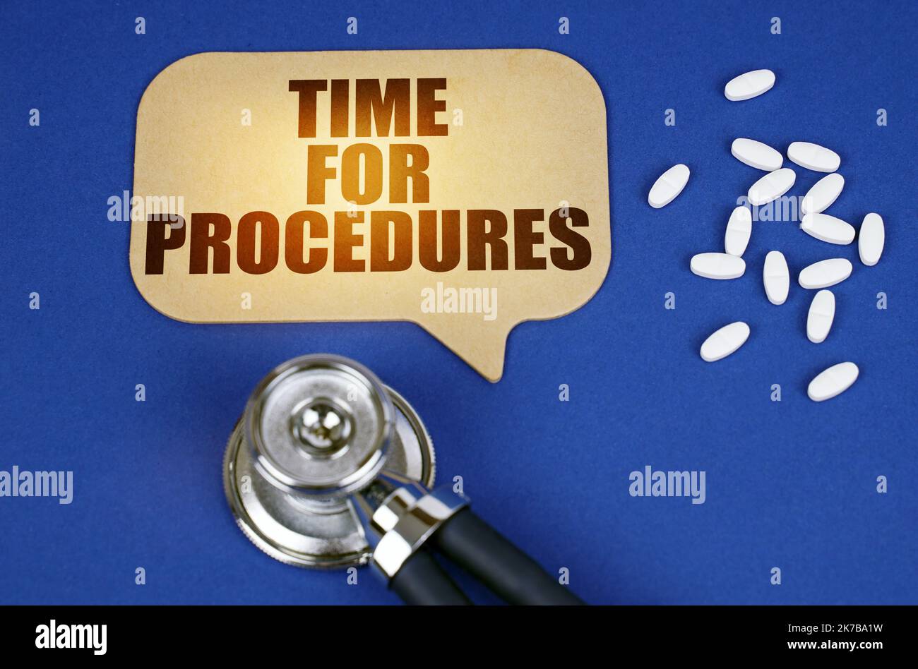 Medical concept. On the blue surface of the tablet, a stethoscope and a ...
