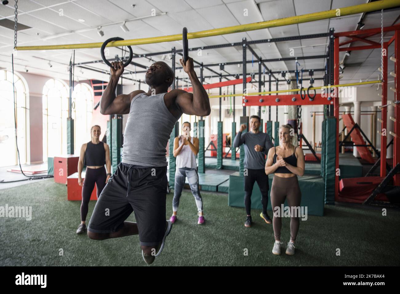 Man encouraging hi-res stock photography and images - Alamy