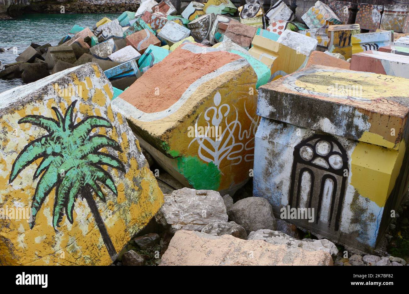 Wave dissipating concrete blocks Cubes of Memory painted by Agustin ...