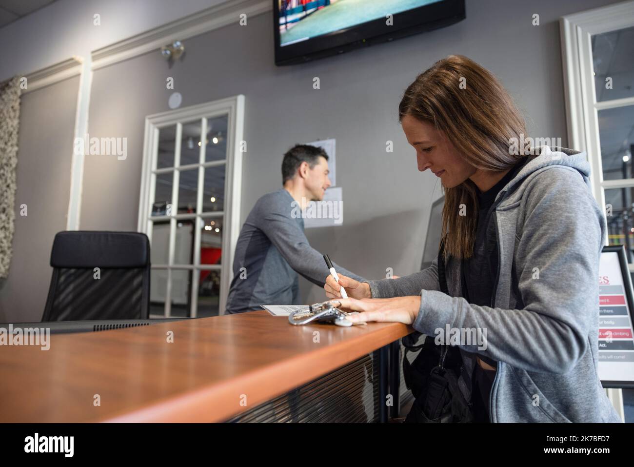 Filling out a registration form hi-res stock photography and images - Alamy