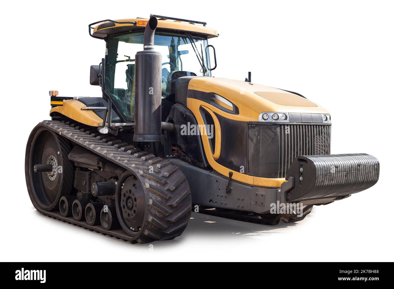 New yellow caterpillar tractor isolated over white, with clipping path ...