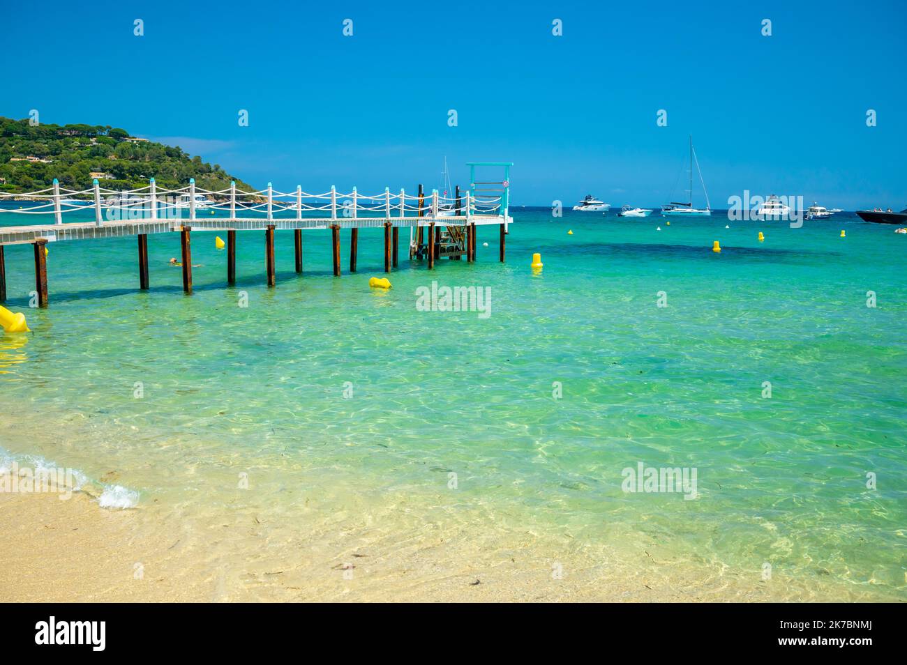 Wooden pier for guests of yachts on legendary Pampelonne beach near ...