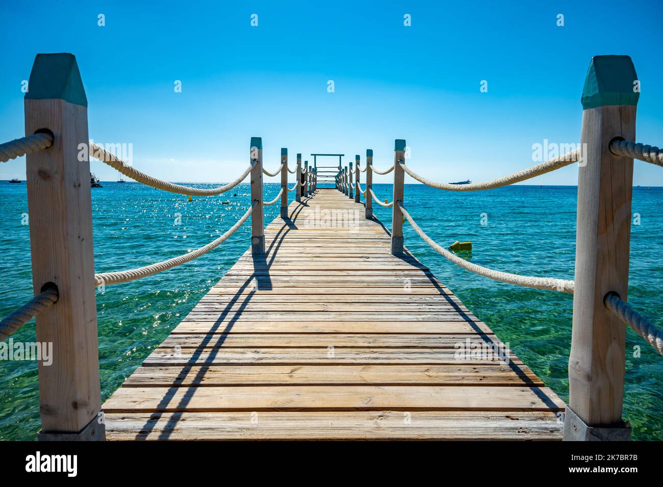 Wooden pier for guests of yachts on legendary Pampelonne beach near ...