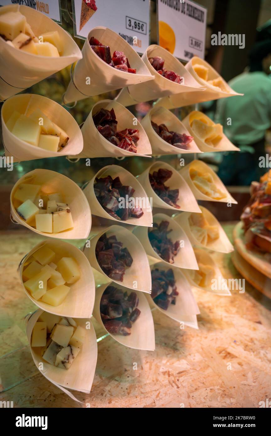 Spanish street food, fresh cutted cheese, jamon ham, choriso sausage ...