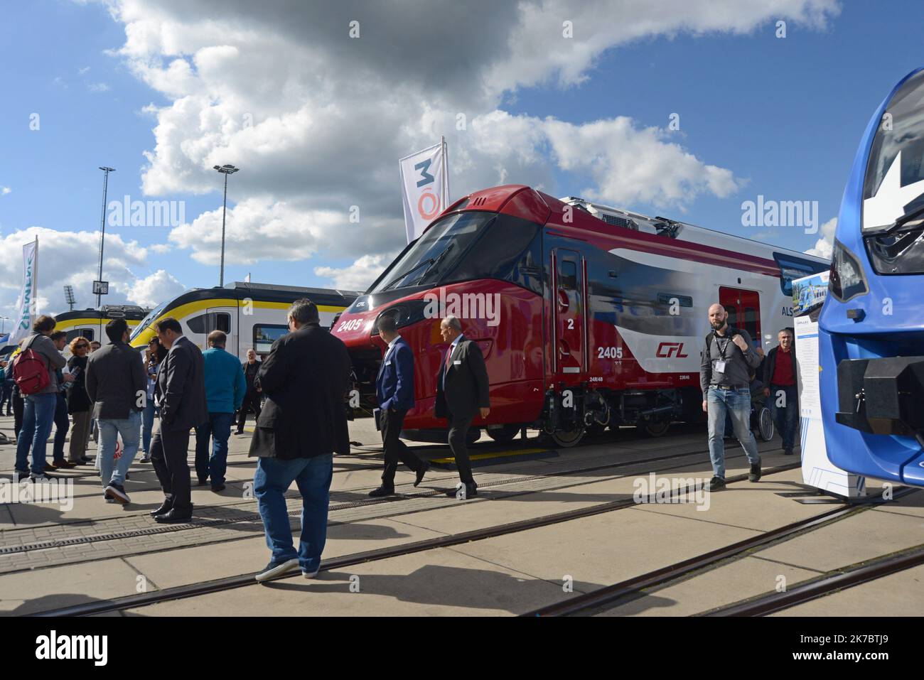 Railway Engineers examining new trains and displays at Innotrans ...