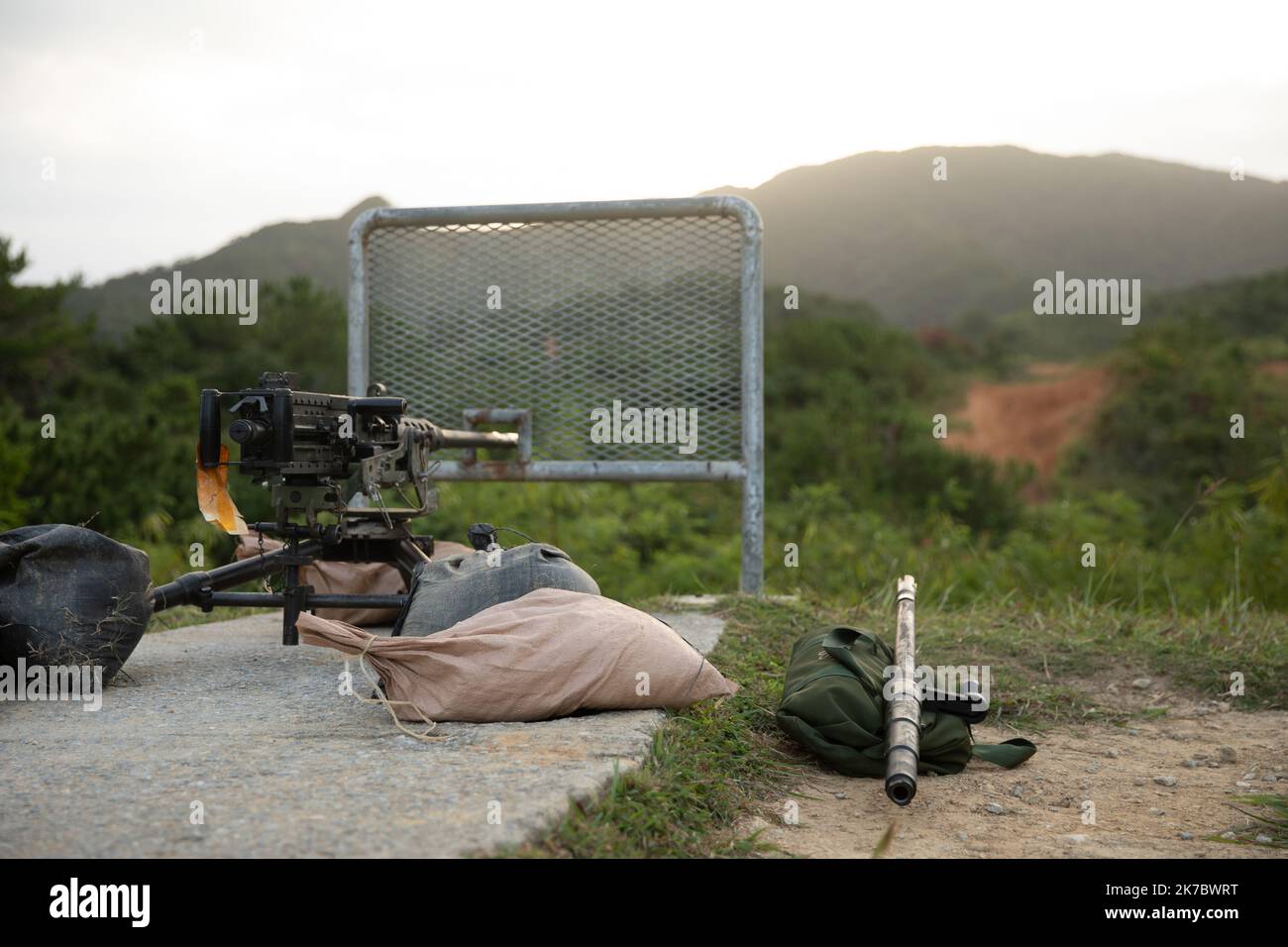 A Browning M2 .50 caliber machine gun is staged as part of a machine ...