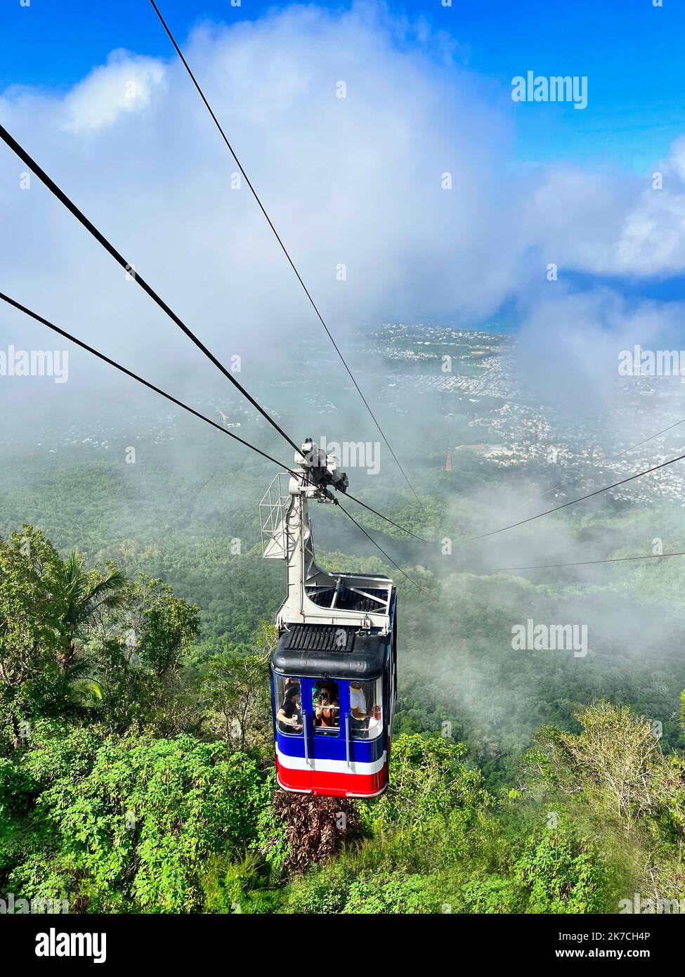 Panoramic of funicular over city with sea at bottom Stock Photo - Alamy