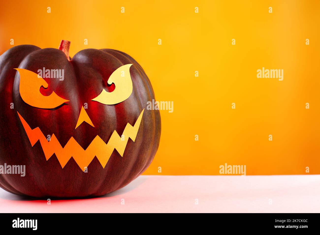 Halloween Pumpkin with Paper Cut Scary Face on Yellow Background. Jack Halloween. Smile Jack ...