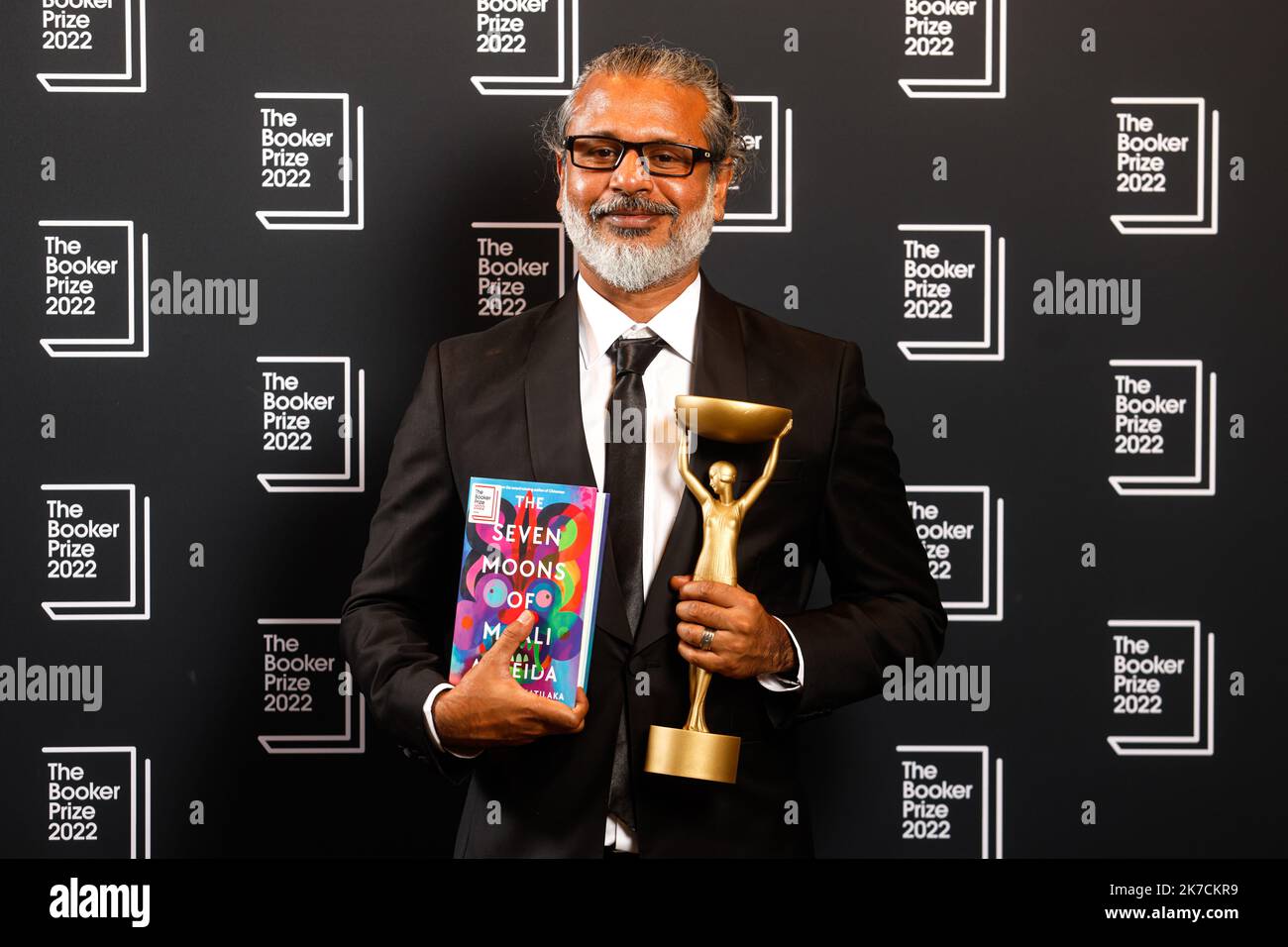 EDITORIAL USE ONLY Winning author Shehan Karunatilaka with his trophy ...