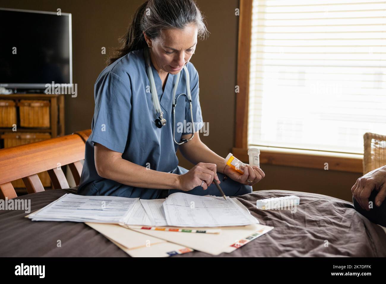 Checking medical records hi-res stock photography and images - Alamy