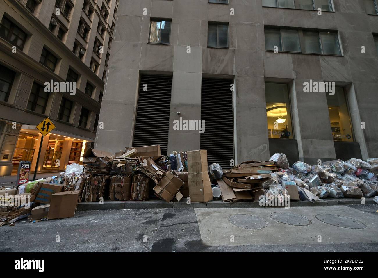 Piles of uncollected garbage seen in lower Manhattan, after two snow ...
