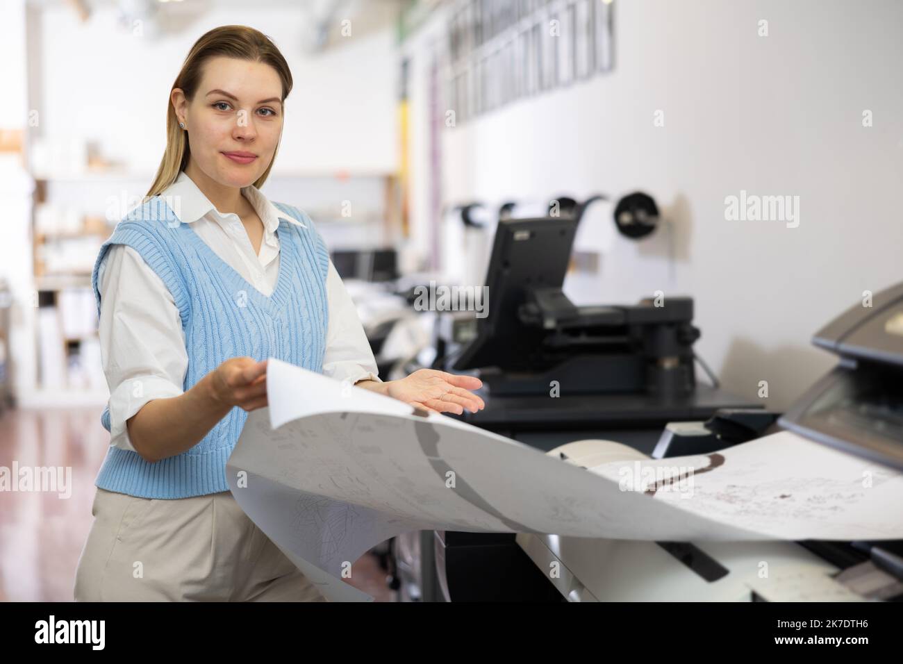 Worker in a printing and press centar check print quality Stock Photo ...