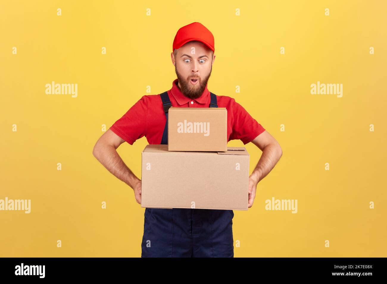 Delivery guy holding big hi-res stock photography and images - Alamy